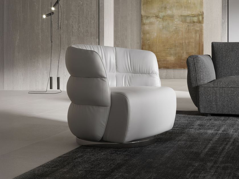 COUTURE Swivel leather armchair with armrests By Natuzzi Italia ...