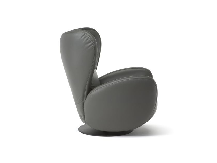 FIORITA Swivel recliner leather armchair with footstool By Natuzzi Italia