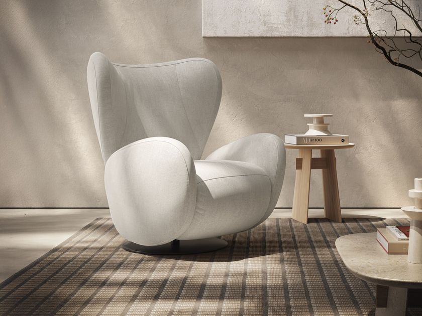 FIORITA Swivel recliner leather armchair with footstool By Natuzzi Italia