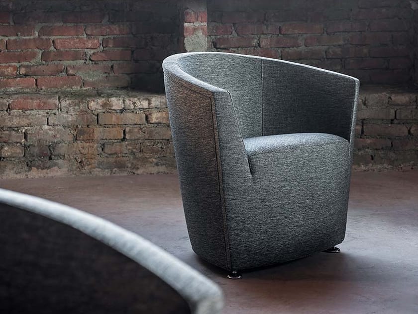 Fabric easy chair with armrests PARENTESI By Tacchini design Pietro Arosio