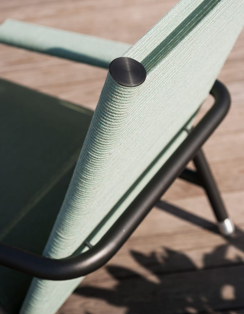 ASTRA Fabric garden armchair with armrests By RODA | design Rodolfo Dordoni