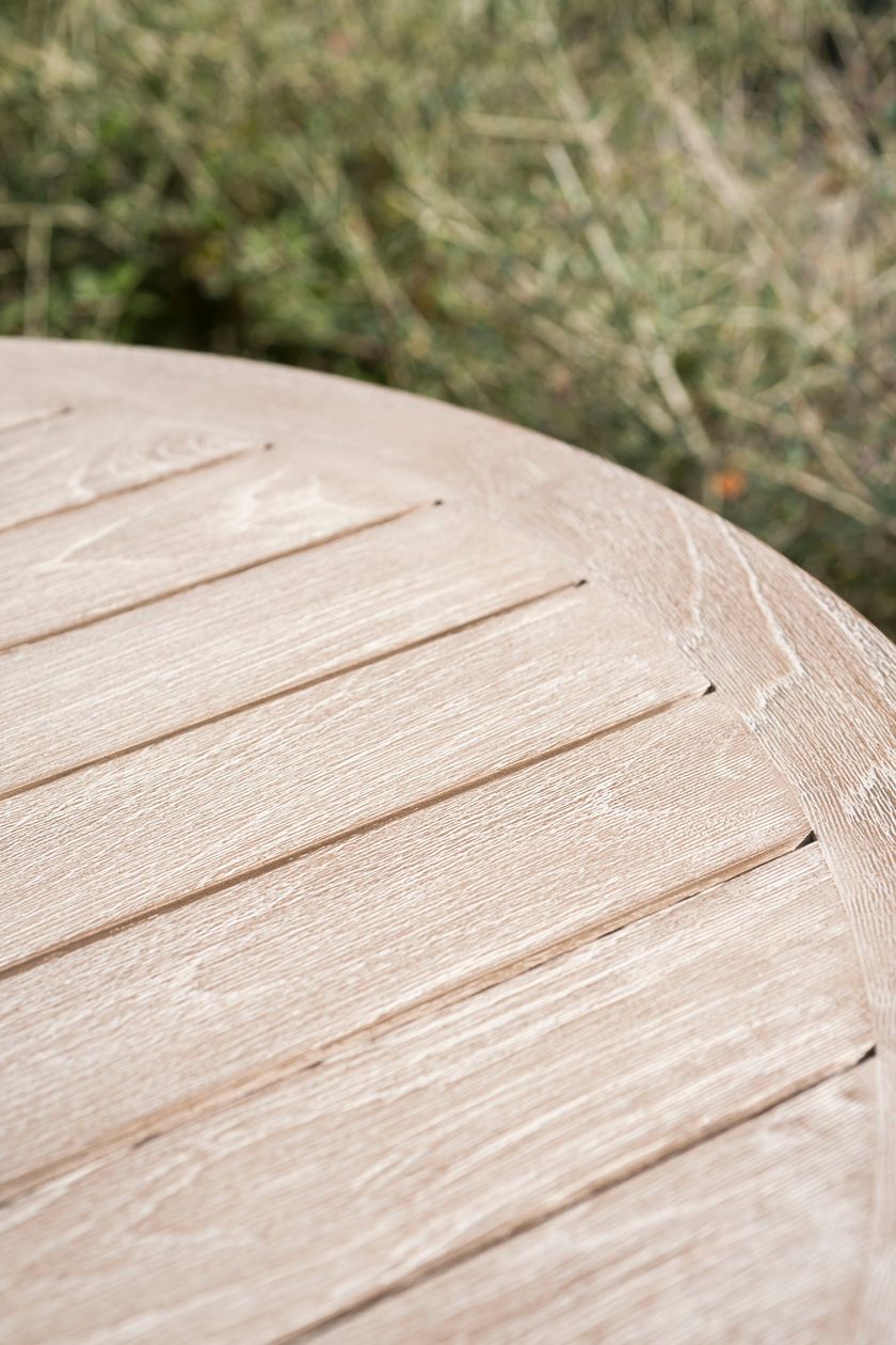 BUTTON Round teak garden table By RODA