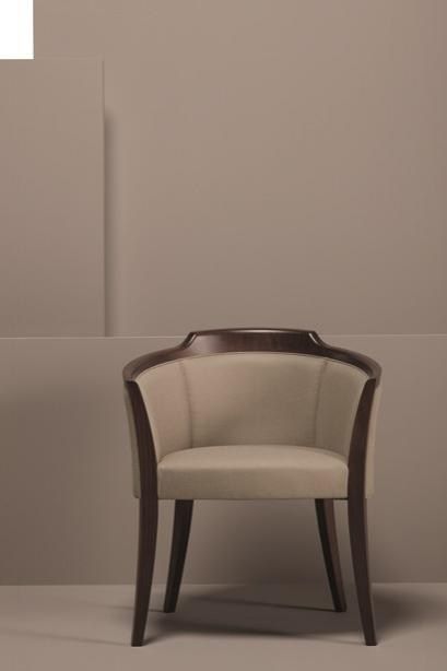 ROTOTÒ Fabric easy chair with armrests By Cizeta
