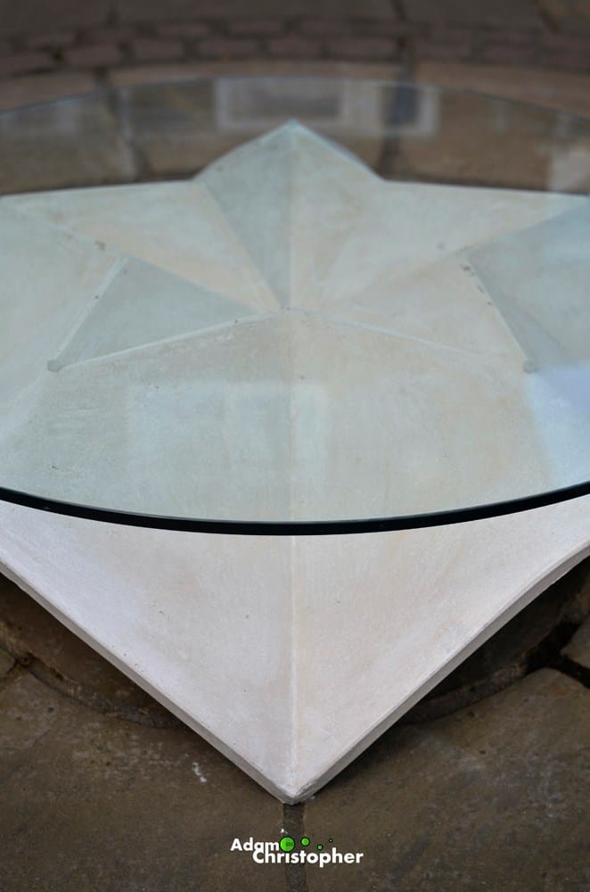 Round concrete garden side table STJERNE By Adam Christopher design ...