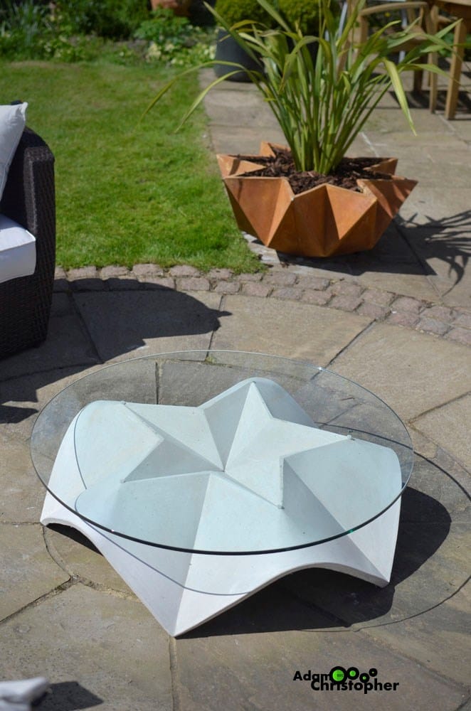 Round concrete garden side table STJERNE By Adam Christopher design ...