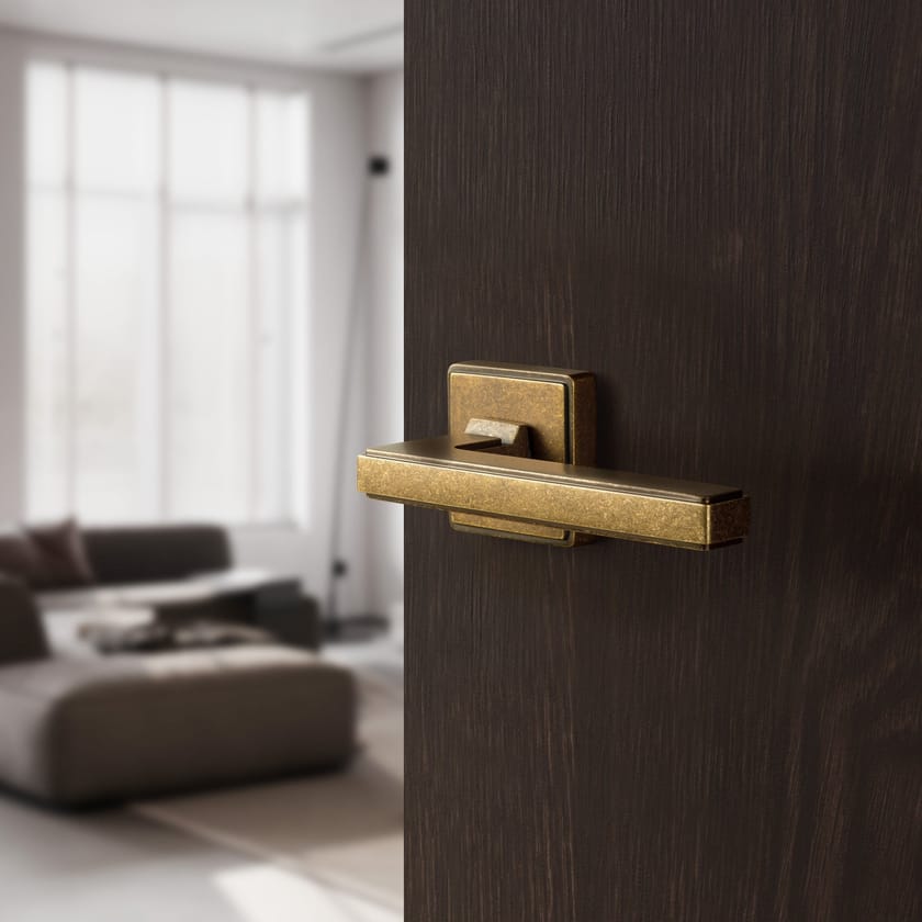 SURREY Metal door handle on rose By LUSSO