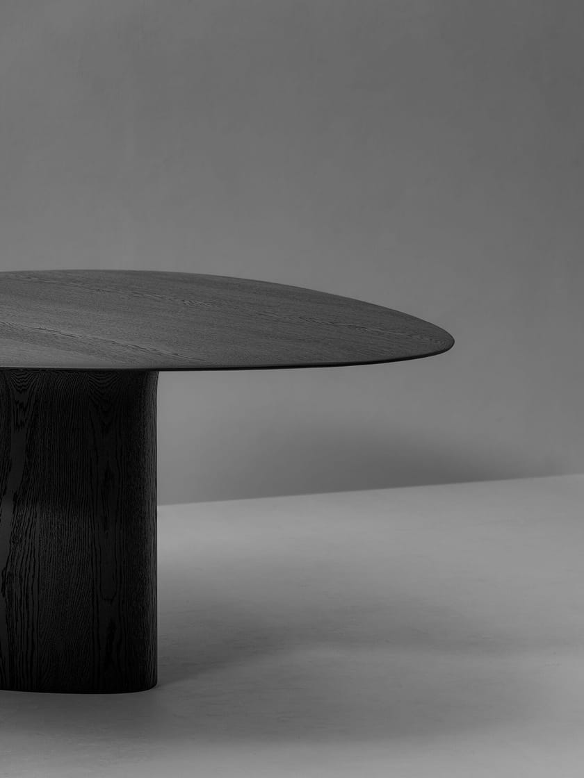 ANVIL Triangular oak table By Van Rossum