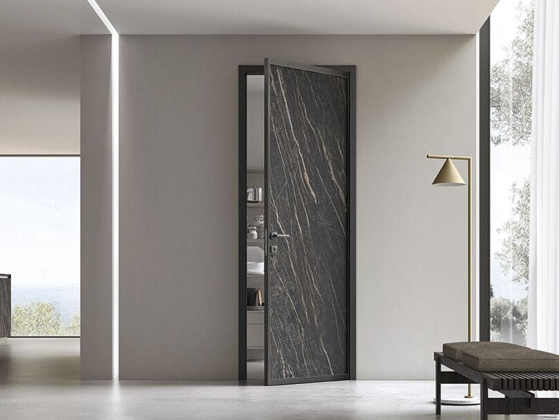 SKYLINE Porta a battente in Laminam® con cerniere a scomparsa By Venus Design