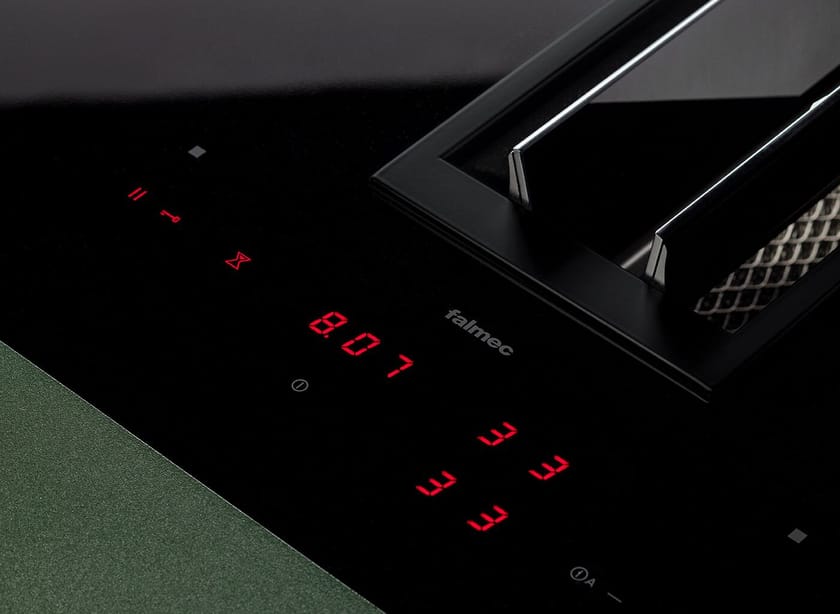 COOKING SYSTEMS Induction glass ceramic hob with integrated hood By Falmec