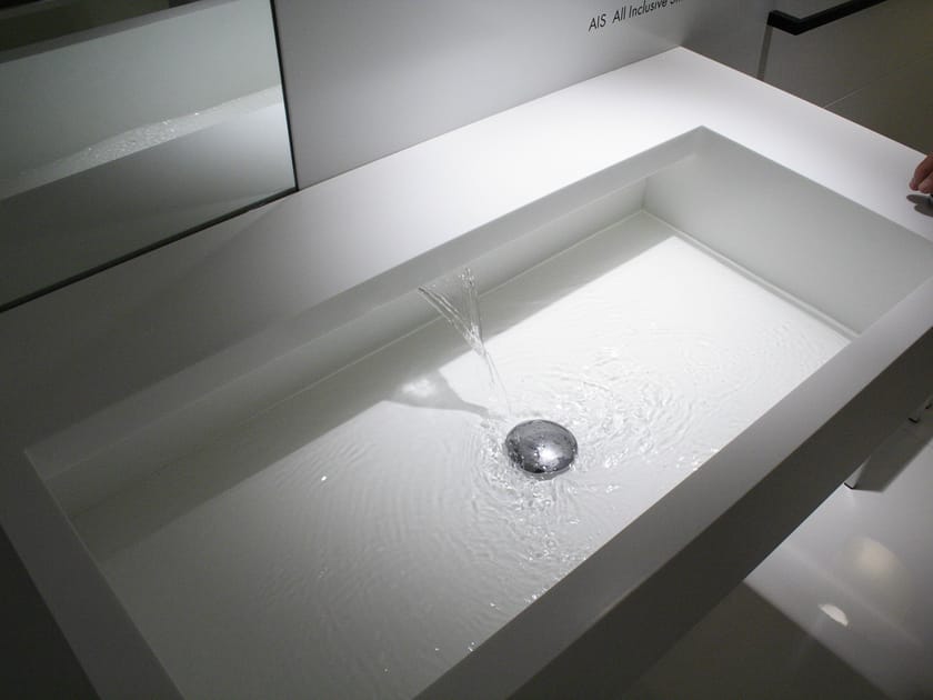 Wall-mounted Corian® washbasin AIS By Moab80 design Fabrizio Milesi