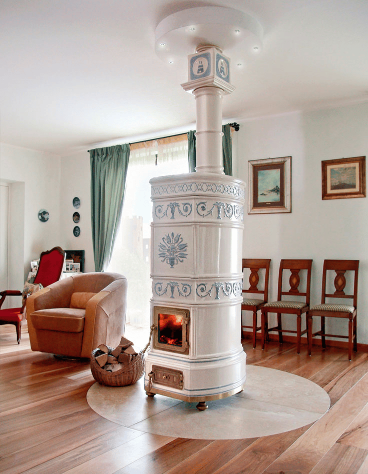 Wood-burning ceramic stove OVALE By LA CASTELLAMONTE