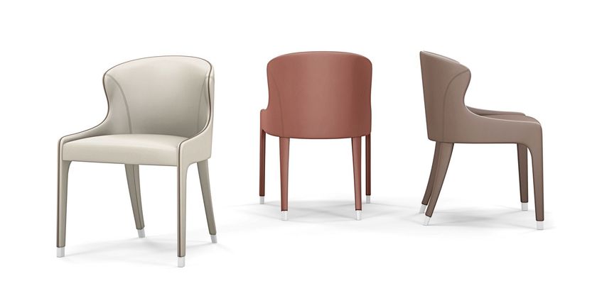 STEEPLE Upholstered fabric chair By Roche Bobois | design Enrico Franzolini