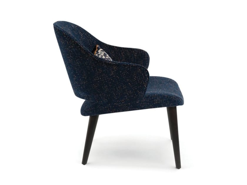 YEL Fabric easy chair with armrests By Roche Bobois | design Fred Rieffel