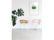 CYBORG CLUB Woven wicker chair with armrests By Magis