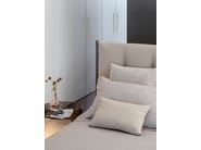 KOI Fabric double bed with high headboard By Flou