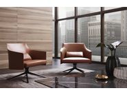 STANFORD Swivel tanned leather armchair with armrests By Poliform ...