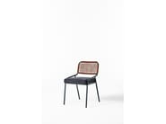 TAI Fabric and leather chair By Meridiani | design Andrea Parisio