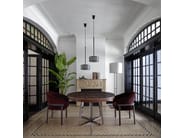 AVA Extending round porcelain stoneware dining table By Ligne Roset ...