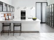 Contemporary style wood-product fitted kitchen with integrated handles ...