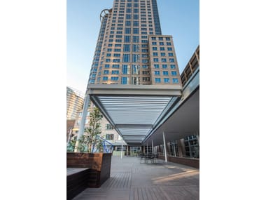 Motorized pergola with adjustable louvers AERO® By RENSON