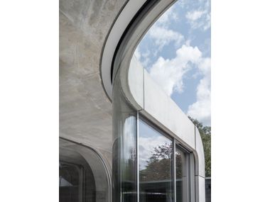 ARC Curved glass and aluminium sliding window By Sky-Frame
