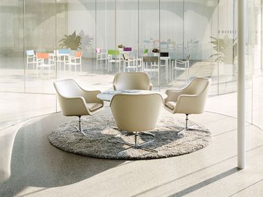 BUMPER Upholstered with 4-spoke base chair with armrests By Herman ...