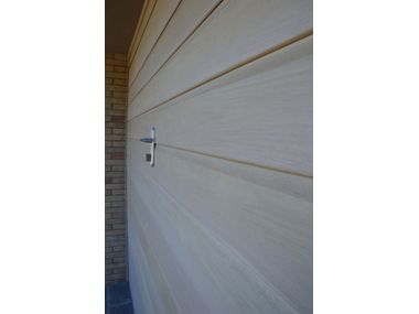 Up-and-over garage door Garage door By Bussi