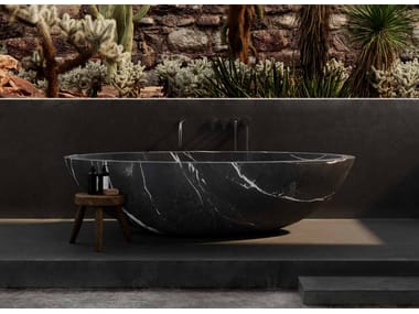 TULUM Freestanding oval natural stone bathtub By COCOON