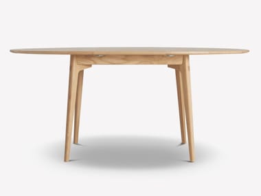 DULWICH Extending round oak table By Case | design Matthew Hilton