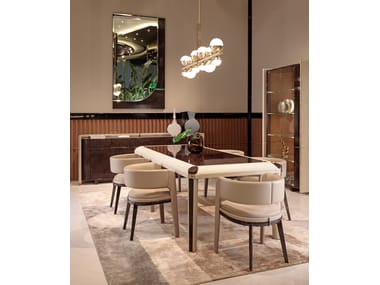 ECLIPSE Leather easy chair with armrests By Turri | design Andrea Bonini