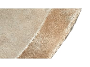 IN TOUCH Solid-color round fabric rug By Cassina