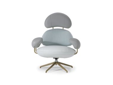 ENSIS Swivel recliner leather armchair with footstool By Natuzzi Italia ...