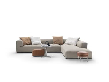 PERRY Sectional fabric sofa with integrated magazine rack By Flexform | design Antonio Citterio