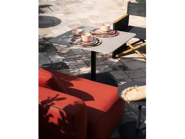 BUTTON Round teak garden side table By RODA