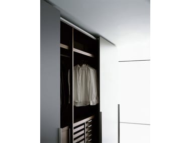 STORAGE SLIDING Sectional wardrobe with sliding doors custom By Porro ...
