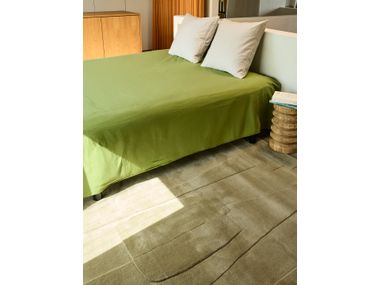 BREF Solid-color handmade rectangular wool rug By Serge LESAGE