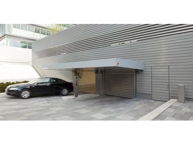 Sectional door Slatted exterior doors By ASSA ABLOY Entrance Systems