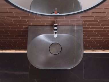 L’ANTIC COLONIAL TONO Wall-mounted oval natural stone washbasin By ...