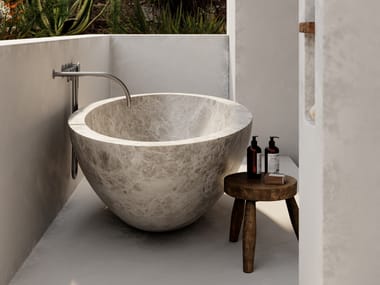 TULUM Freestanding oval natural stone bathtub By COCOON