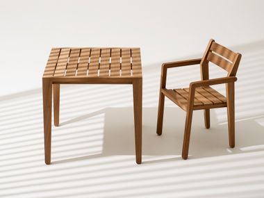 ZANIA Stackable iroko garden chair with armrests By RODA