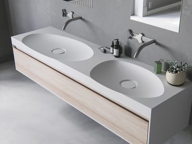 Oval Meridian Solid Surface® washbasin with integrated countertop LAGOON-01 By Le Projet