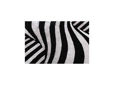 WEAVE Custom viscose and wool rug with optical pattern By Loominology