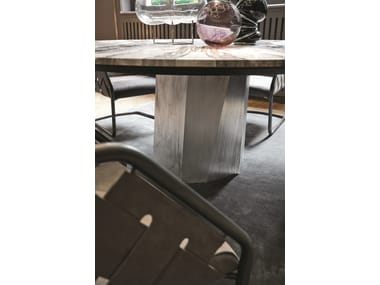 ZENITH Round table with metal base and stone top By Henge | design ...