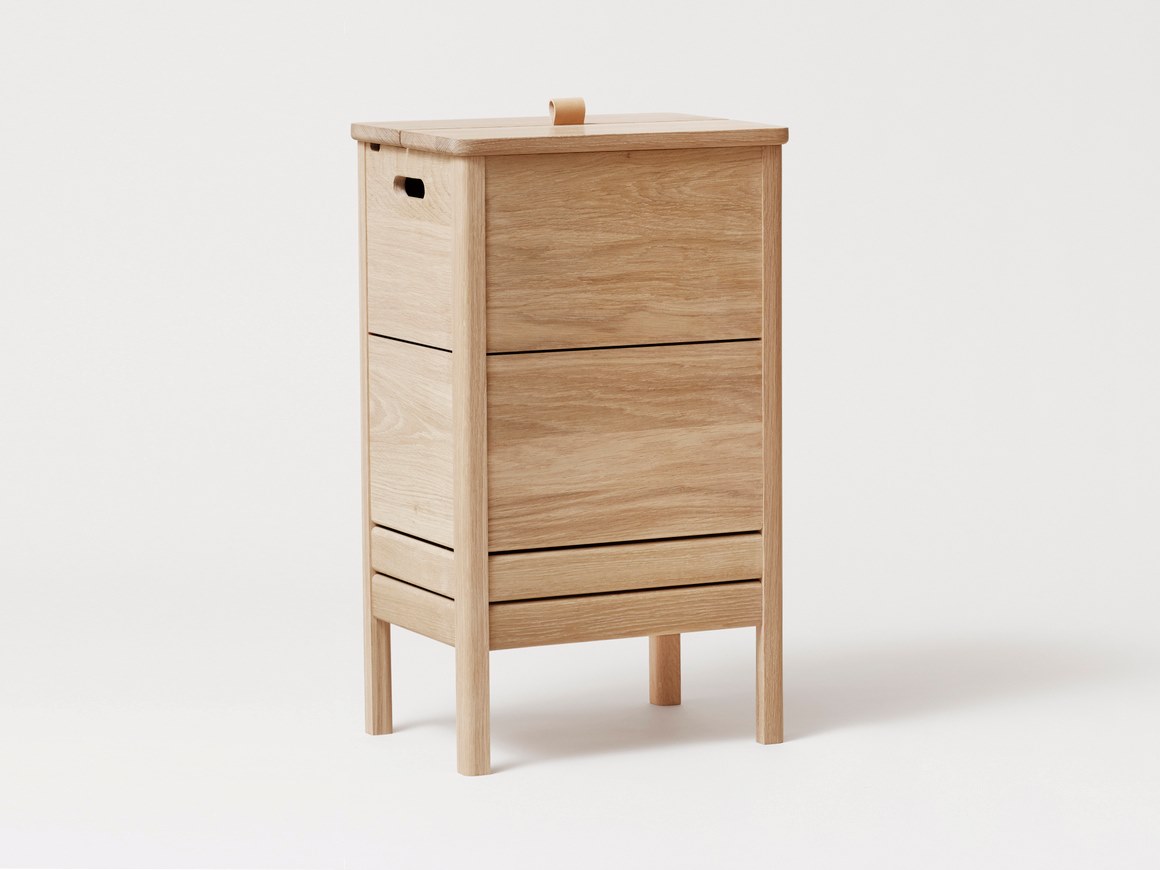 A LINE Oak laundry container By Form & Refine