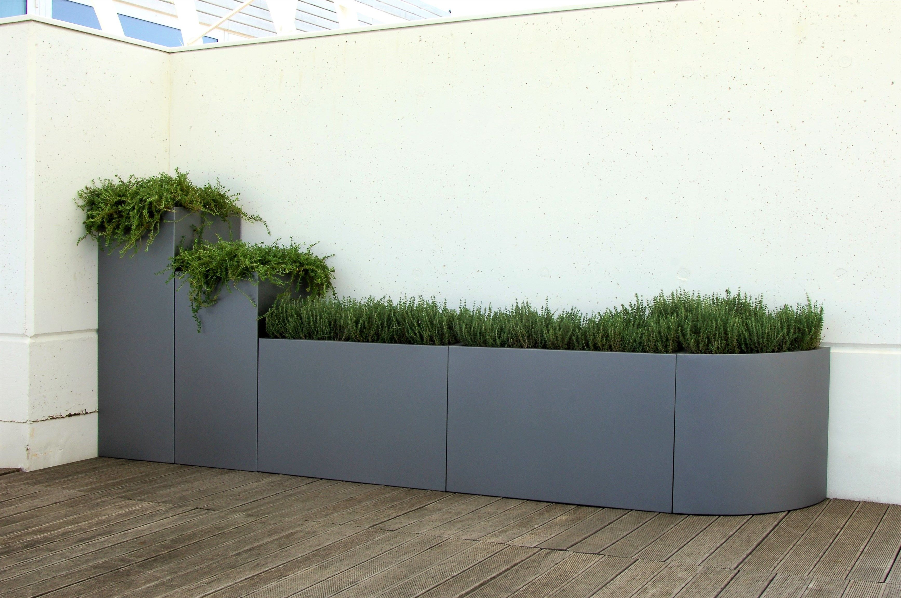 A Modular stainless steel planter By BLOSS