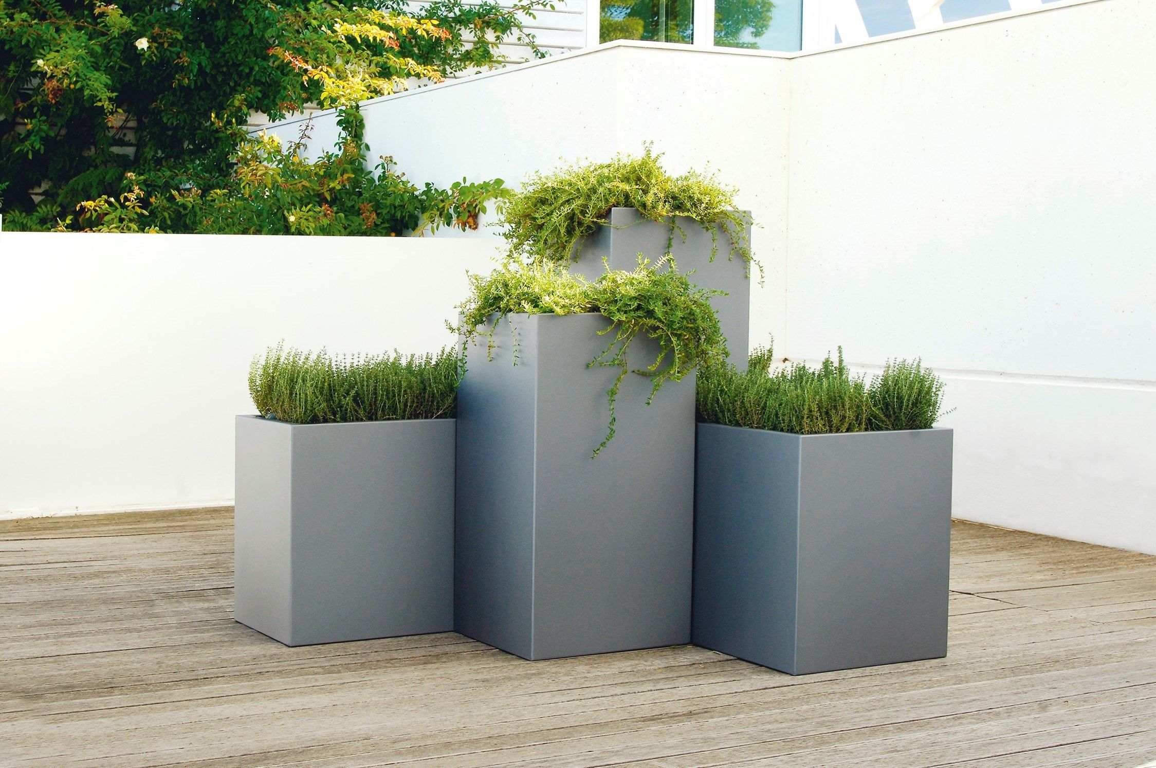 A Modular stainless steel planter By BLOSS