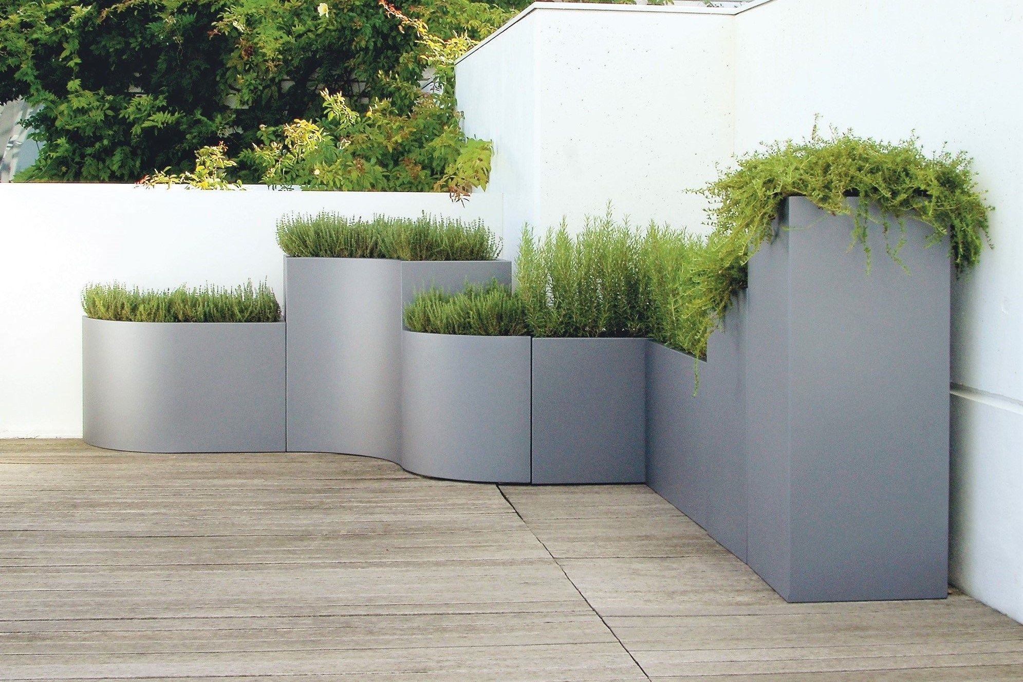 A Modular stainless steel planter By BLOSS