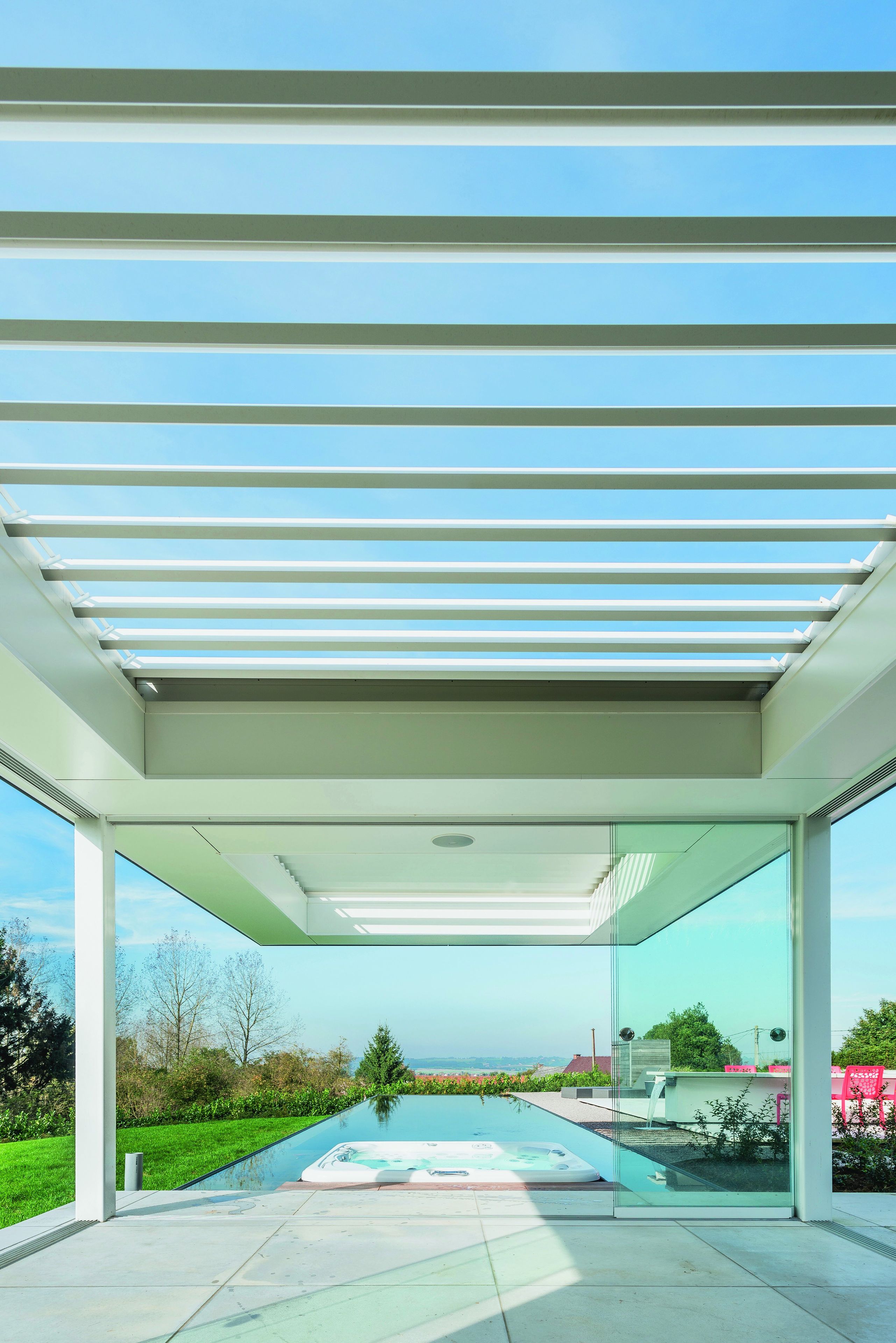 Motorized pergola with adjustable louvers AERO® By RENSON