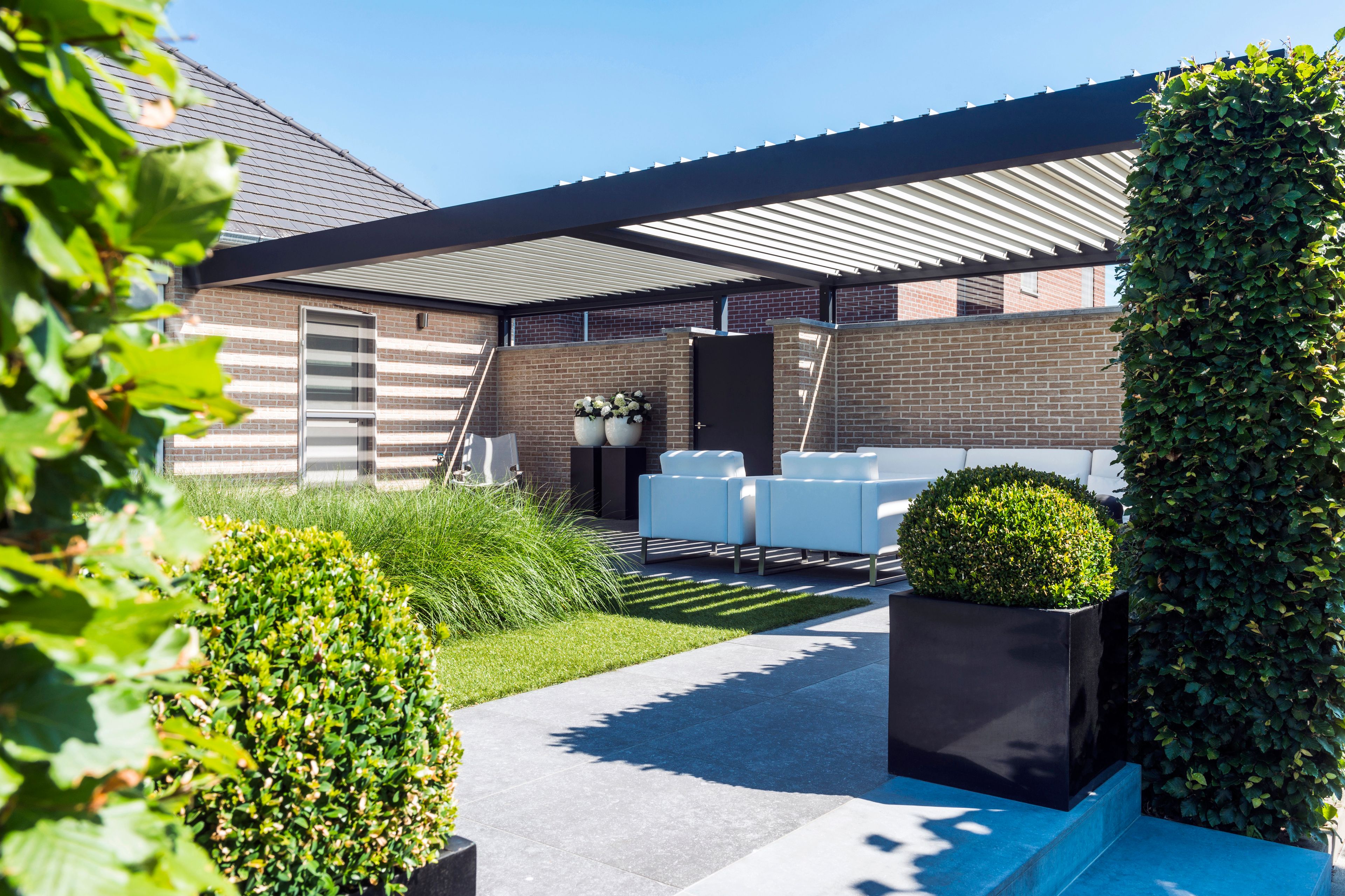 Motorized pergola with adjustable louvers AERO® By RENSON