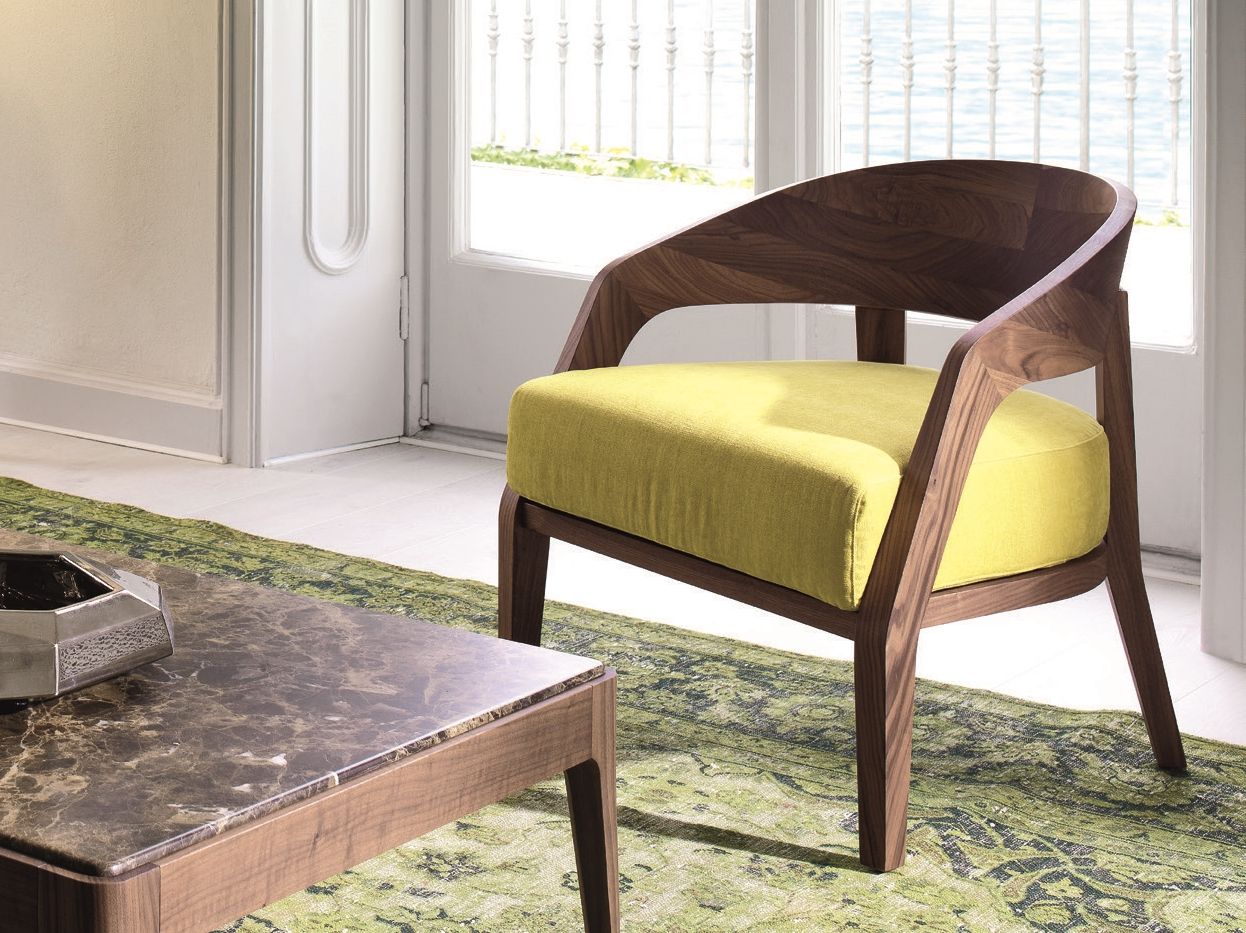 ALBA Walnut easy chair with armrests By Porada | design Margie Walraven